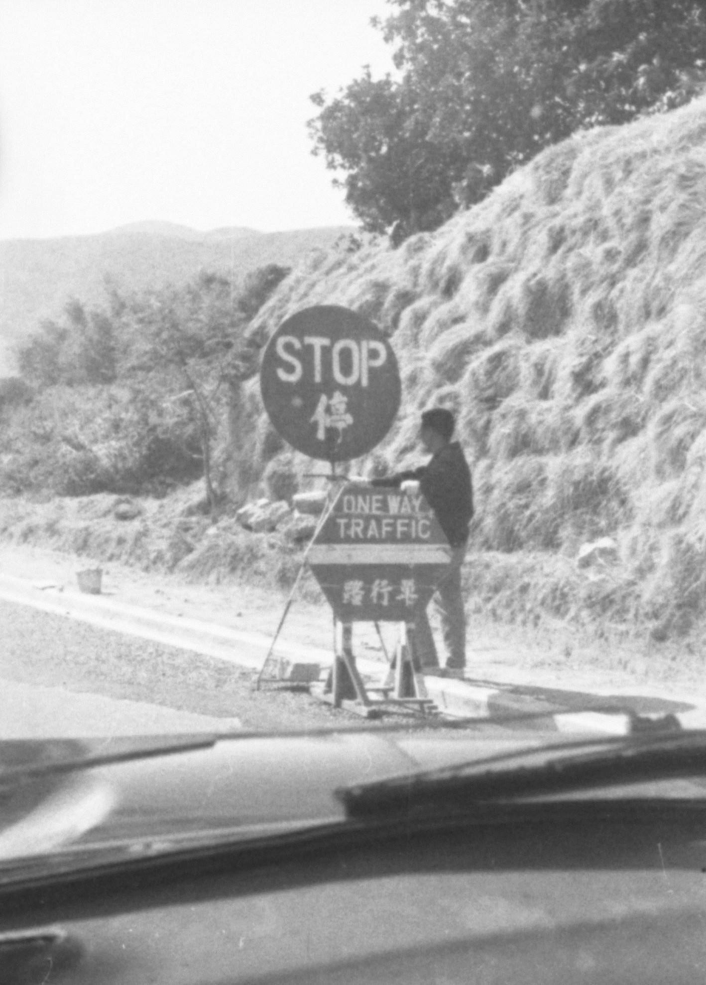 35A-28p Image of signs marked "stop" and "one way traffic" in Hong Kong ...