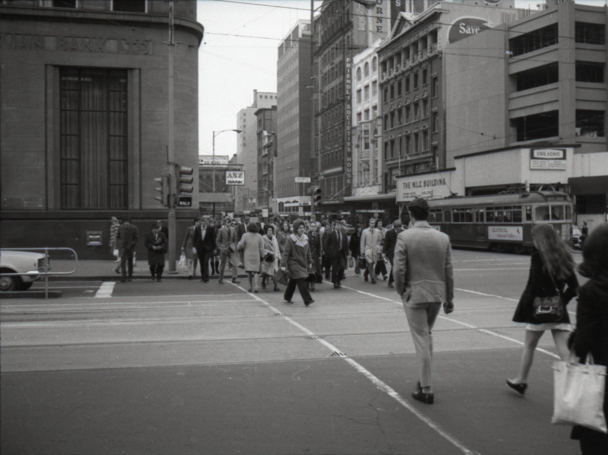 35B-14l Image of pedestrians crossing at Elizabeth Street and Collins ...